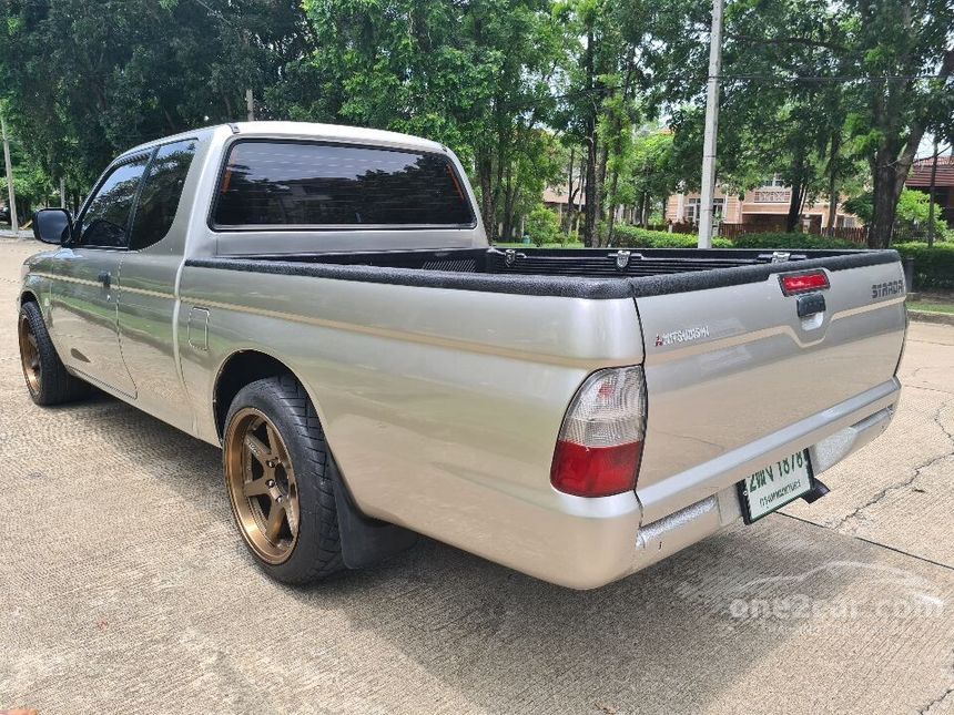 Mitsubishi Strada 2005 MEGA CAB GLX 2.8 เกียร์ธรรมดา สีทอง | One2car ...